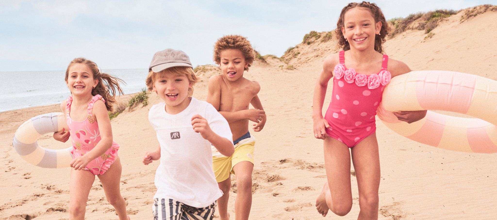 Kinder-Badebekleidung & Badeanzüge | Kinder-Ferien-Shop bei Angel & Rocket